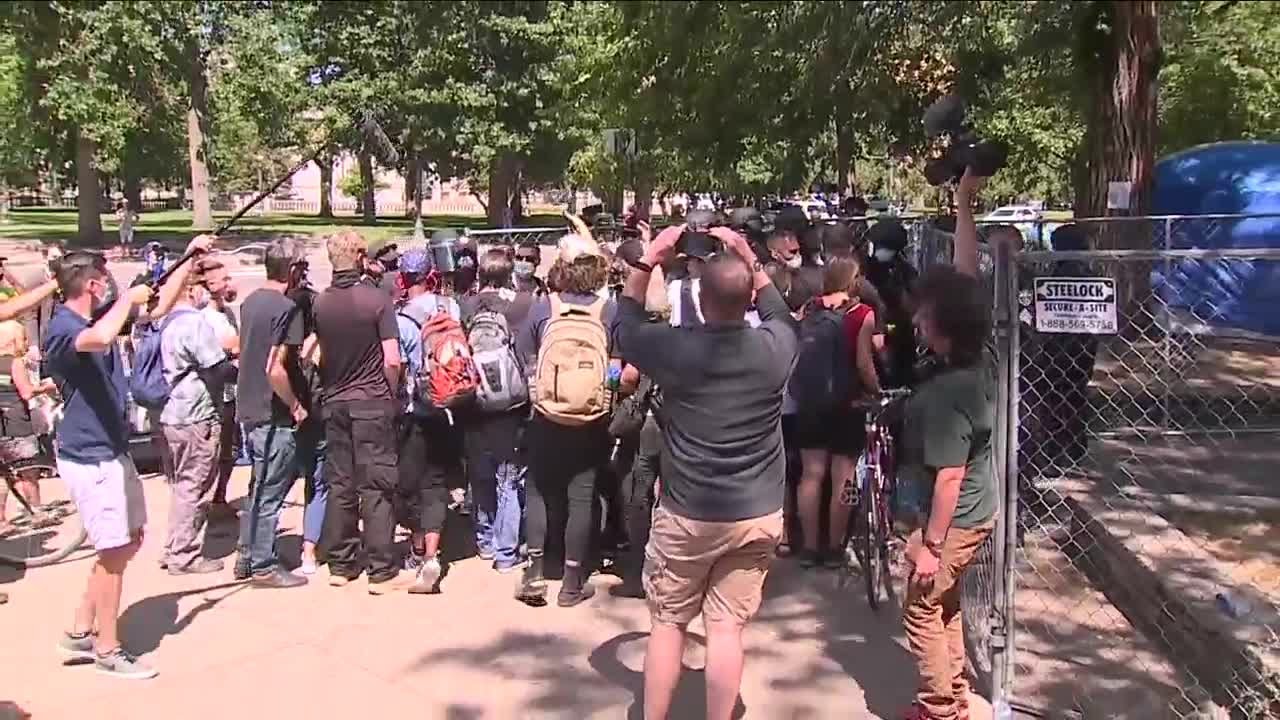 Protesters clash with Denver authorities during sweep of homeless camp ...
