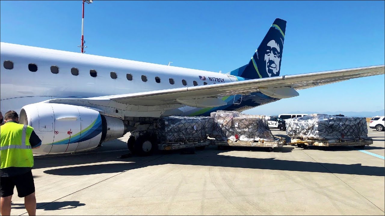 Freight Carts Weighing 17,500 Pounds Detach & Crash Into Parked Embraer ...