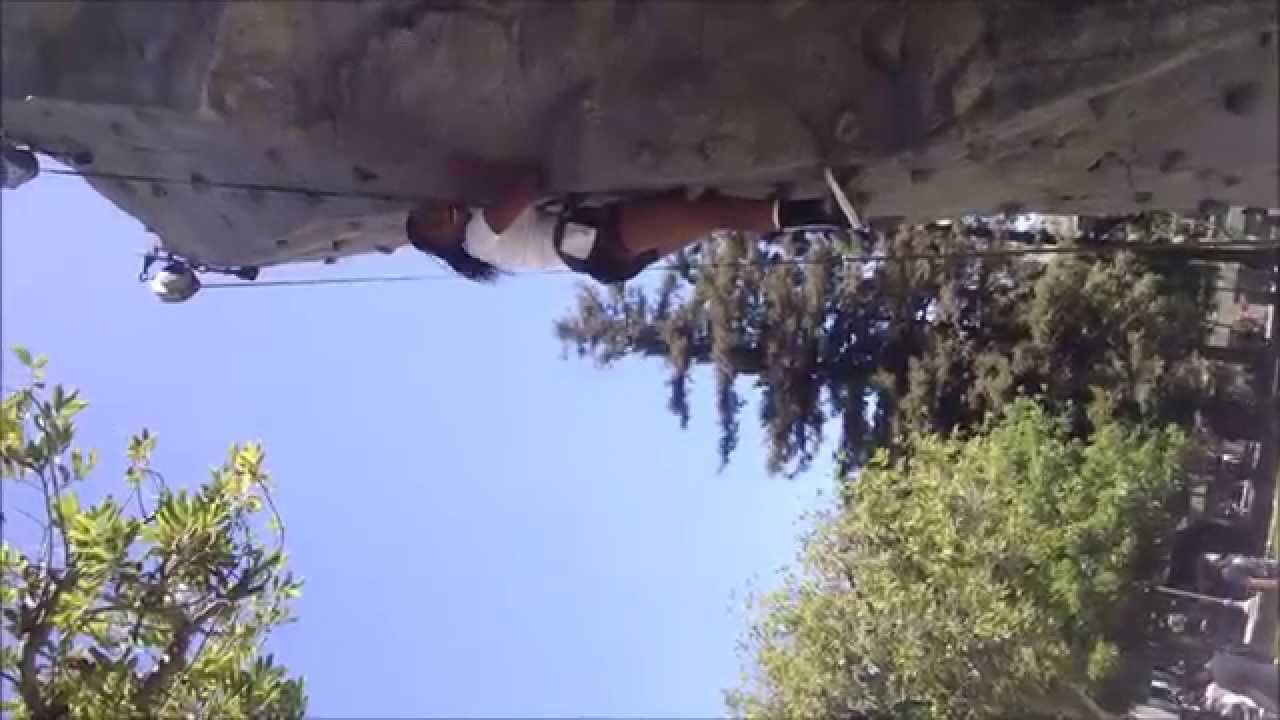 Students climb a portable rock wall in the PCC Quad - YouTube