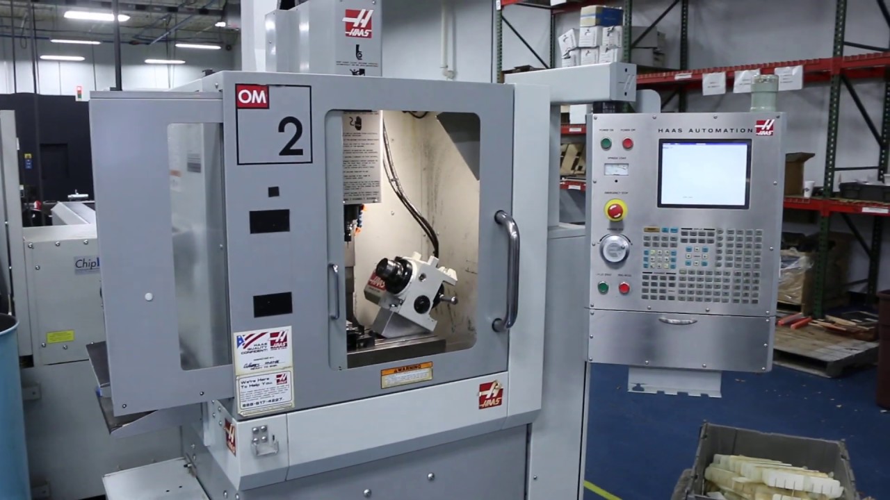 Haas OM-2A VERTICAL MACHINING CENTER - YouTube