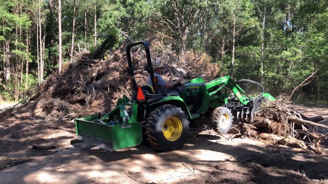 John Deere 3025e and grapple work. - YouTube