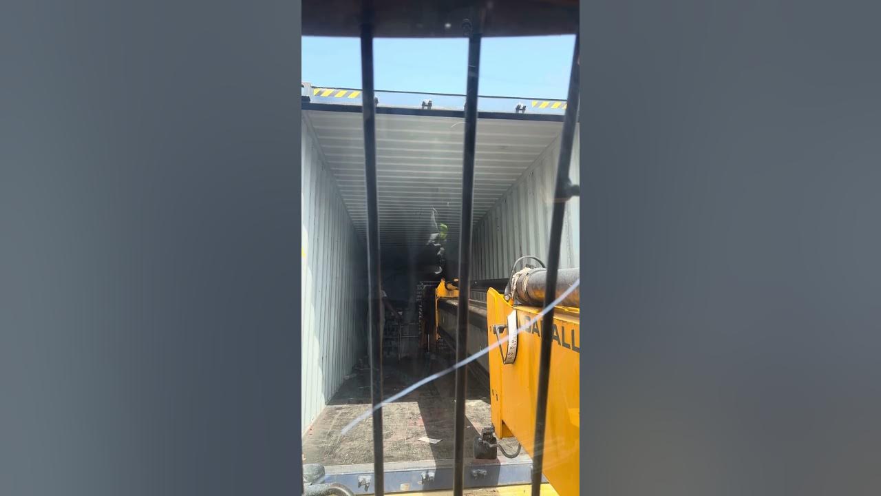 How to offload container with jcb telehandler - YouTube