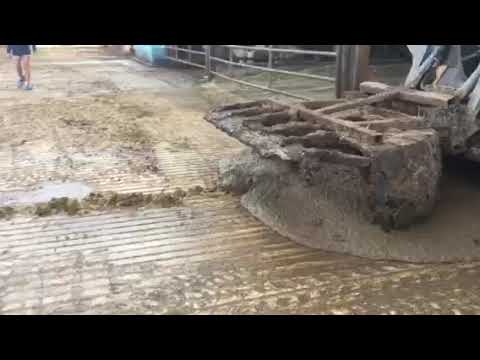 Rubber tire manure scraper 2 - YouTube