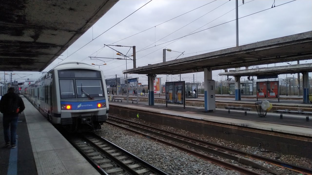 Passage Sans arrêt RER-E MI2N EOLE Z22500 en gare de Noisy-le-Sec - YouTube