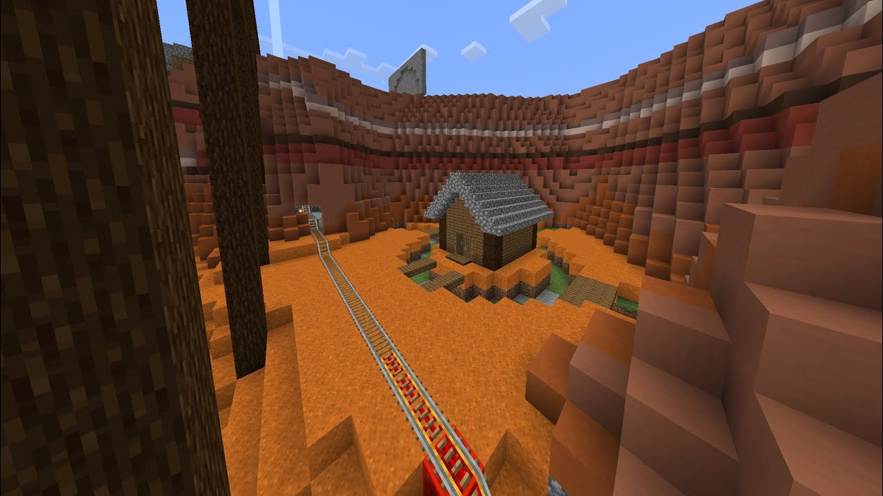 Continuing to put down red sand in the area behind my mountain base ...