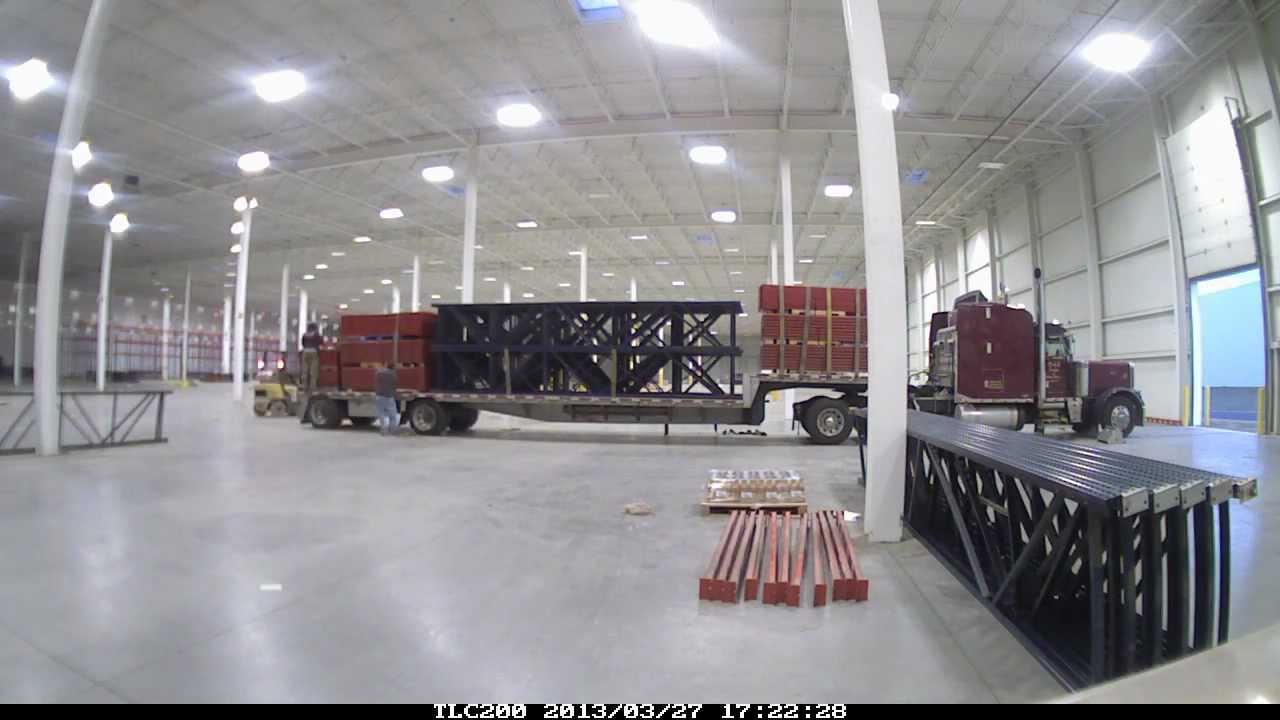 Loading Pallet Rack on a Truck - YouTube