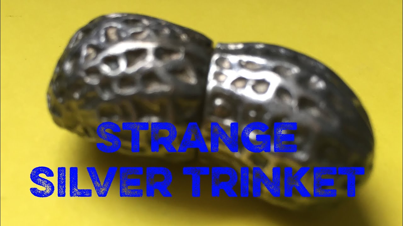 Strange silver trinket. - YouTube