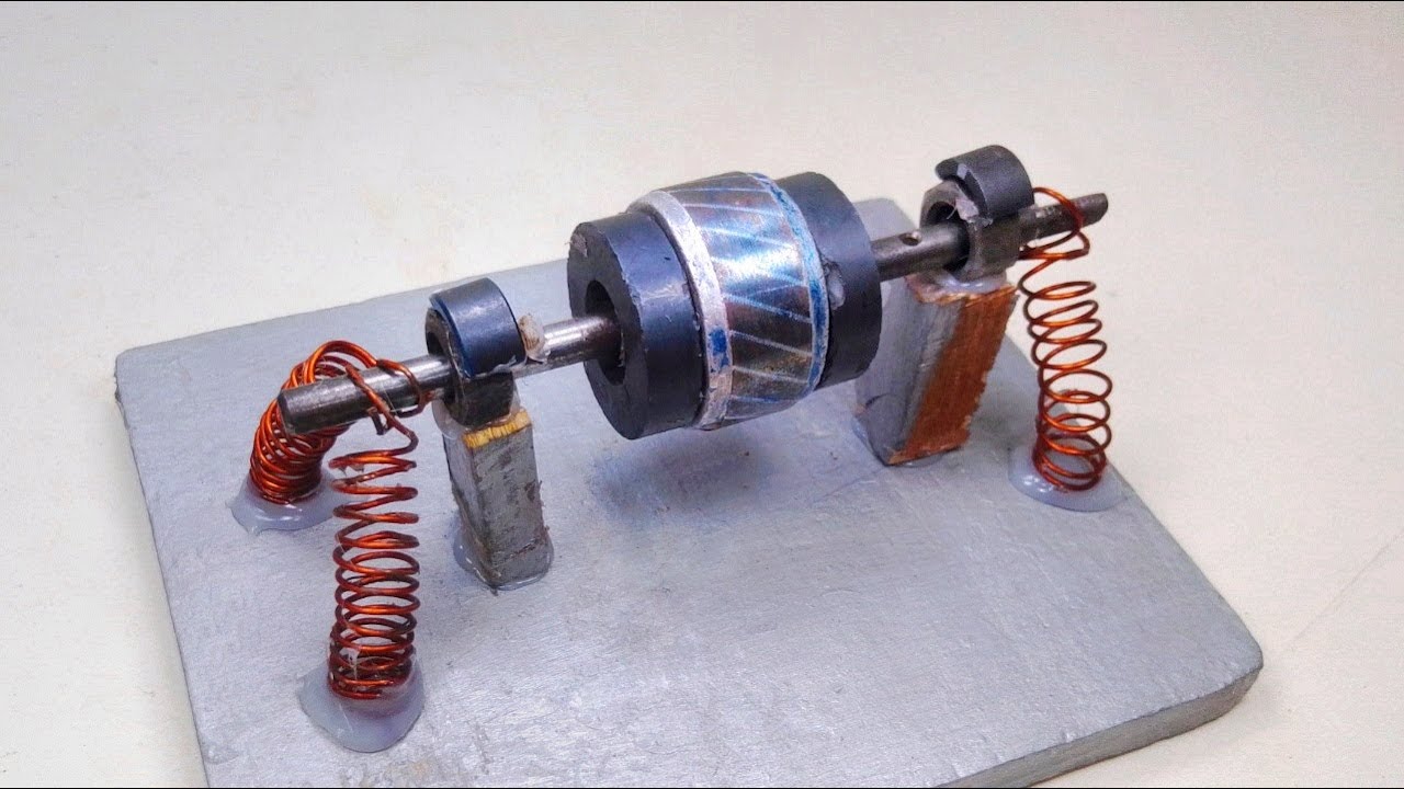 I make free energy generator with magnet and spring Automatic rotated ...