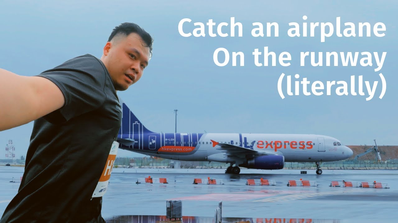 Catching airplane from the runway (HKG 10k Run) - YouTube