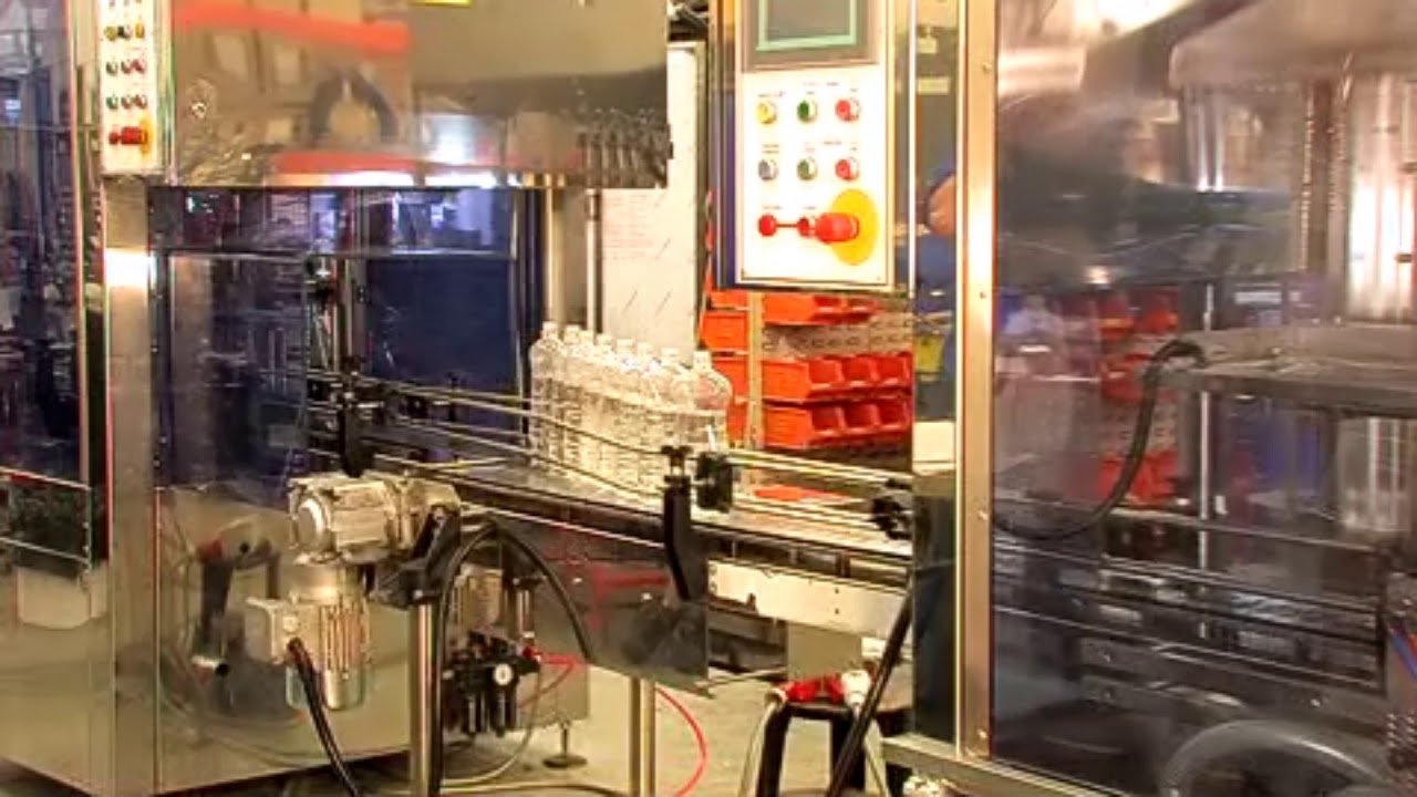 Adelphi Masterfil & Mastercap; eight head filling machine with indexing ...