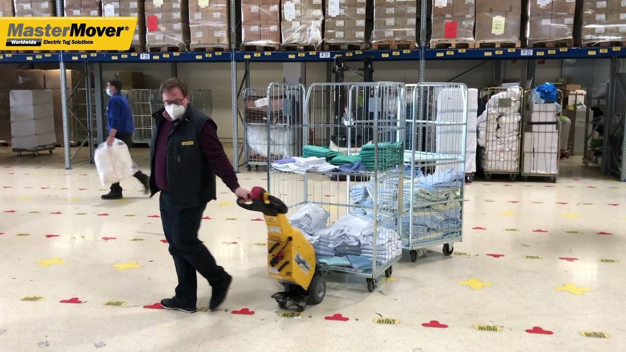 Moving Linked Roll Cages Using an Electric Tug | Facilities Management ...