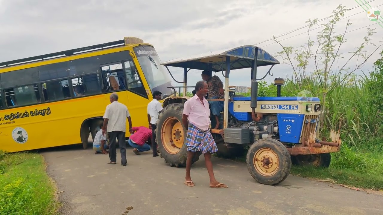 Women's college bus stuck in our village and pulling out by our Swaraj ...