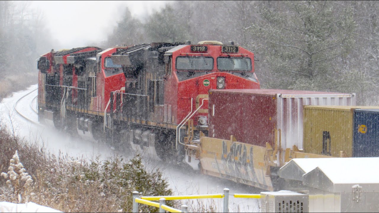 CN Train A422 on the Halton sub at MP 30 in a snowstorm - YouTube