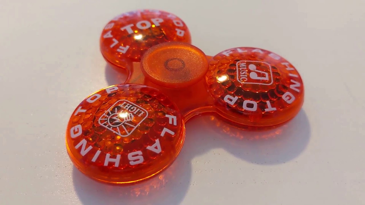 A fidget spinner that plays music but it's low on battery - YouTube