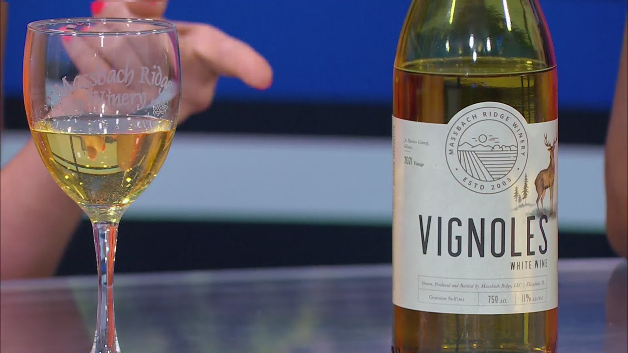 Showing off the crisp white Vignoles from Massbach Ridge Winery - YouTube