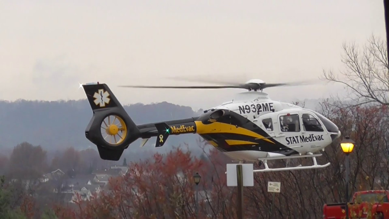 Helicopter Rainy Day Flight. STAT MedEvac Airbus H135 in Light Rain ...