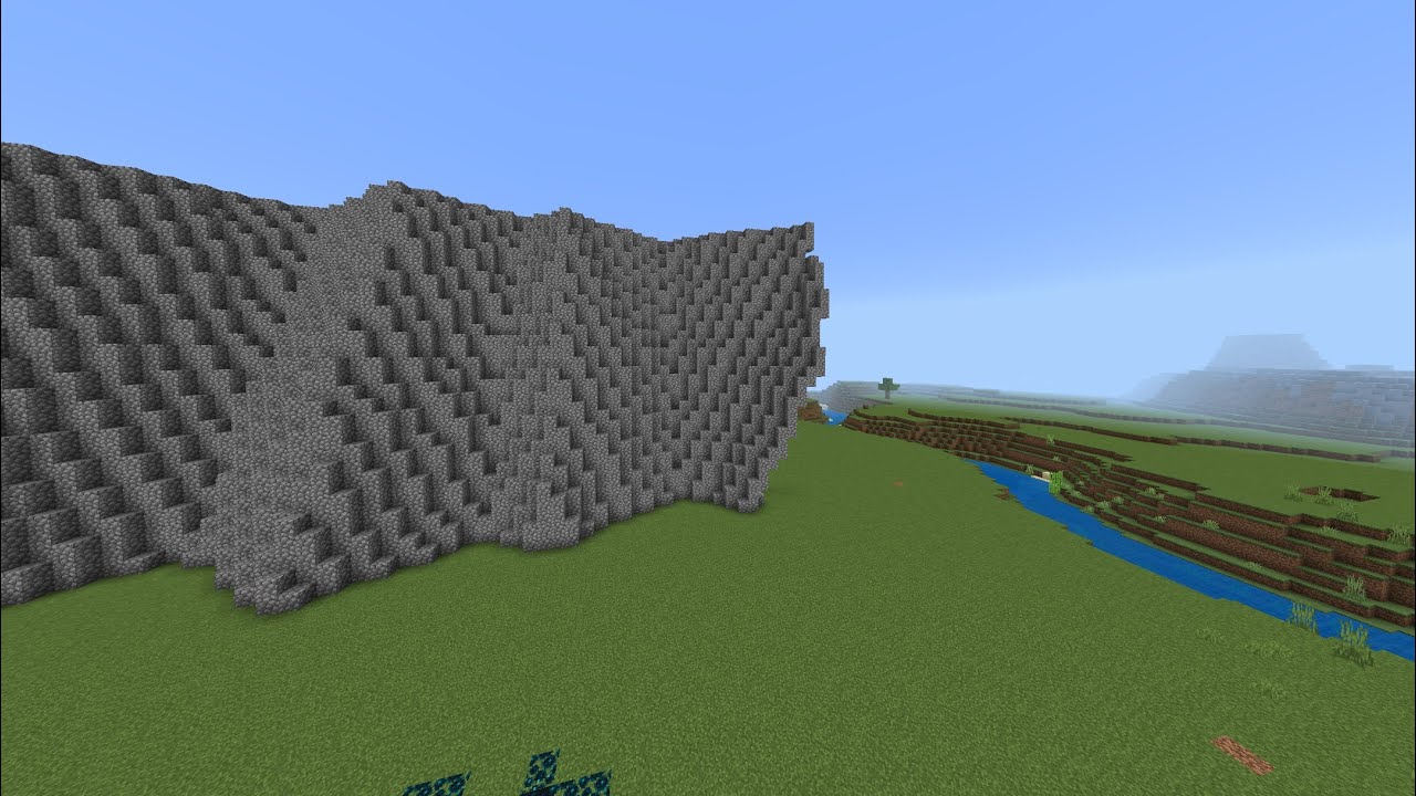 Continuing the haunted house biome mountain range in my survival world ...
