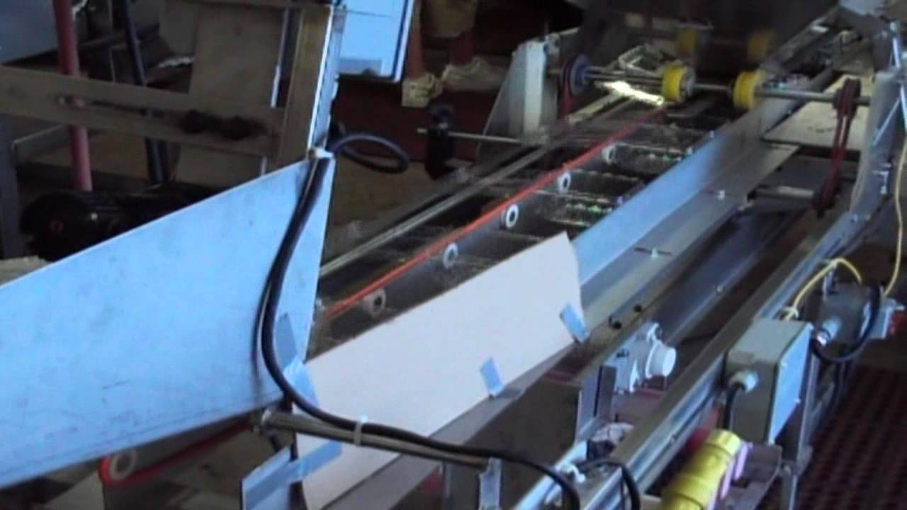 Lakewood CS1 Clamshell Filler & Wheel Denester - YouTube