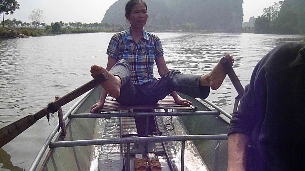 Vietnamese rowing with feet - YouTube