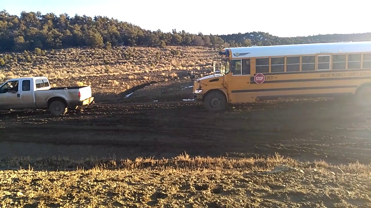 Bus stuck in mud - YouTube