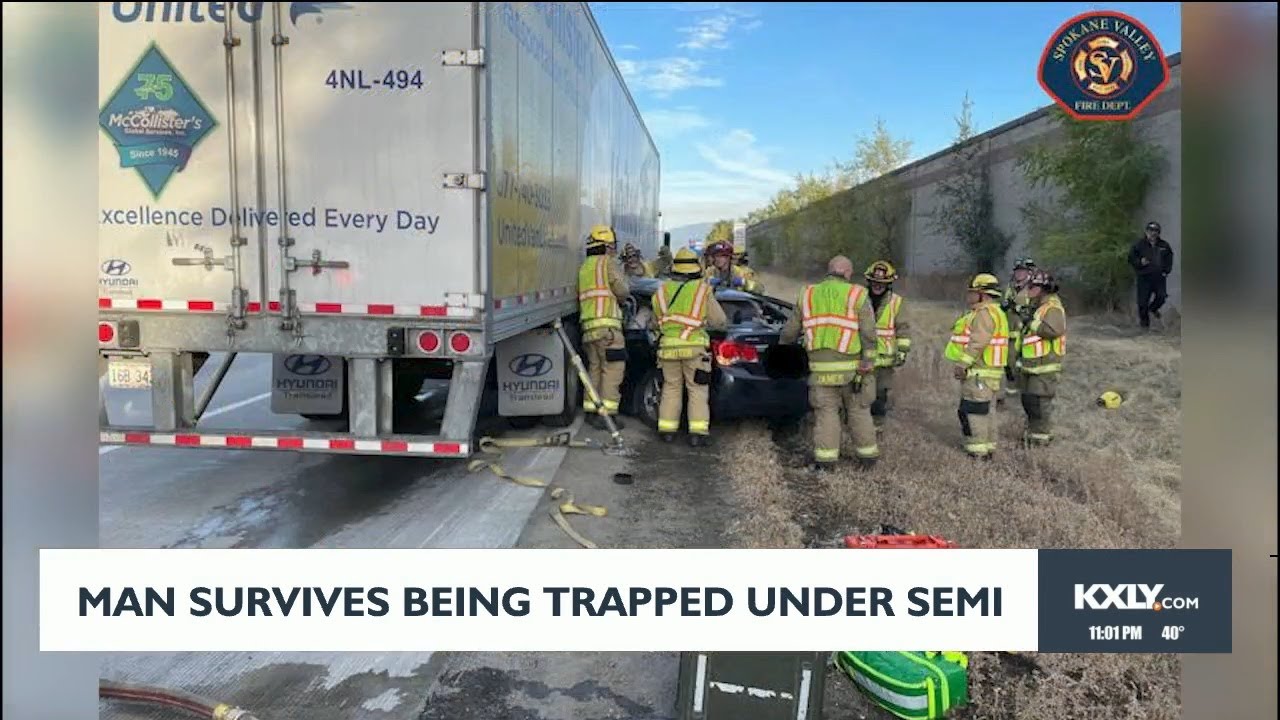 Man survives being trapped under semi truck - YouTube