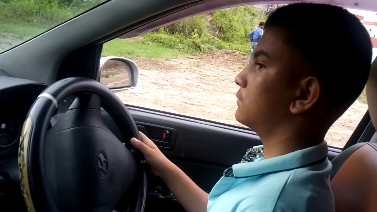 A 13 years old boy driving a car - YouTube
