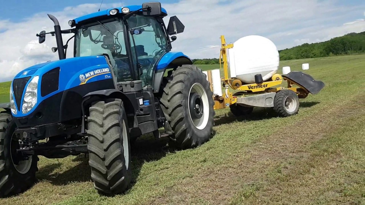 Wrapping Bales With The Vermeer SW5500 Bale Wrapper - YouTube