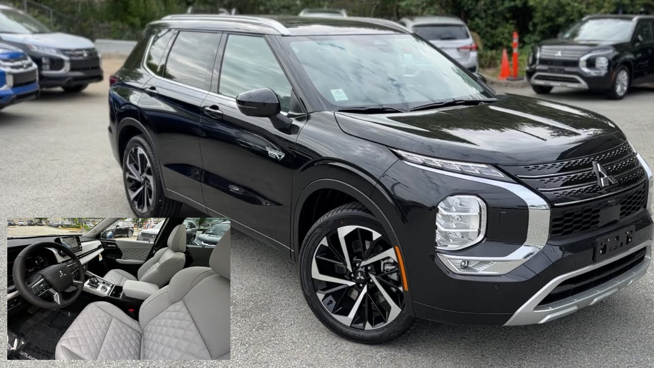 Beauty! A Black Diamond 23 PHEV Outlander with Light Grey interior ...