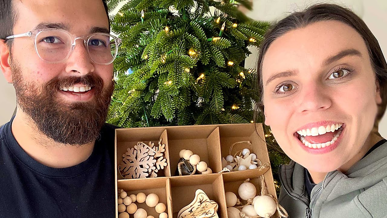 Decorating our first Christmas tree (that James likes) - YouTube