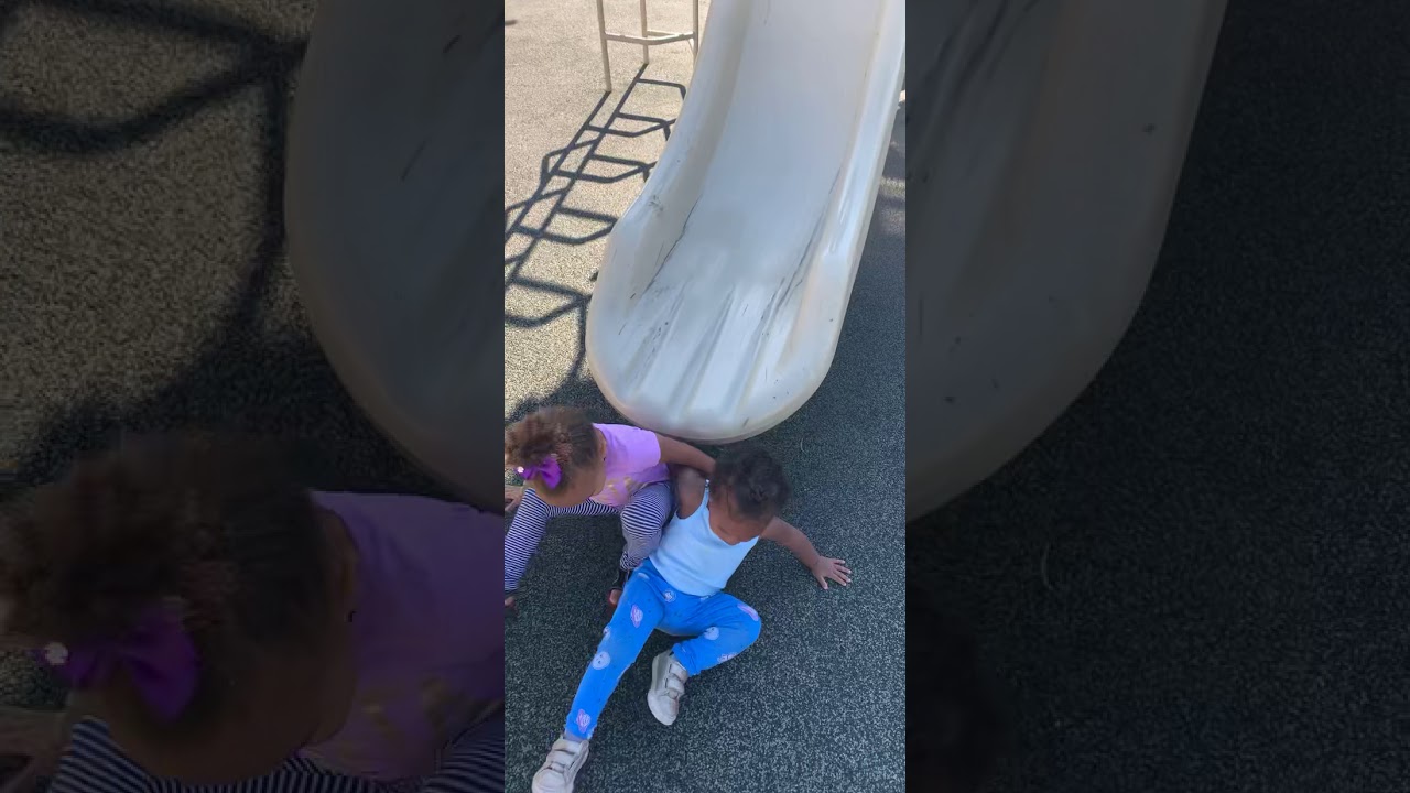 Falling off the slide!! Sister love!! - YouTube