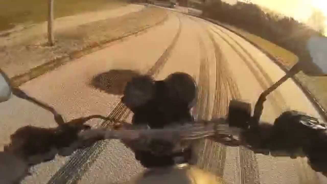 Motorcycle crash in snow - YouTube