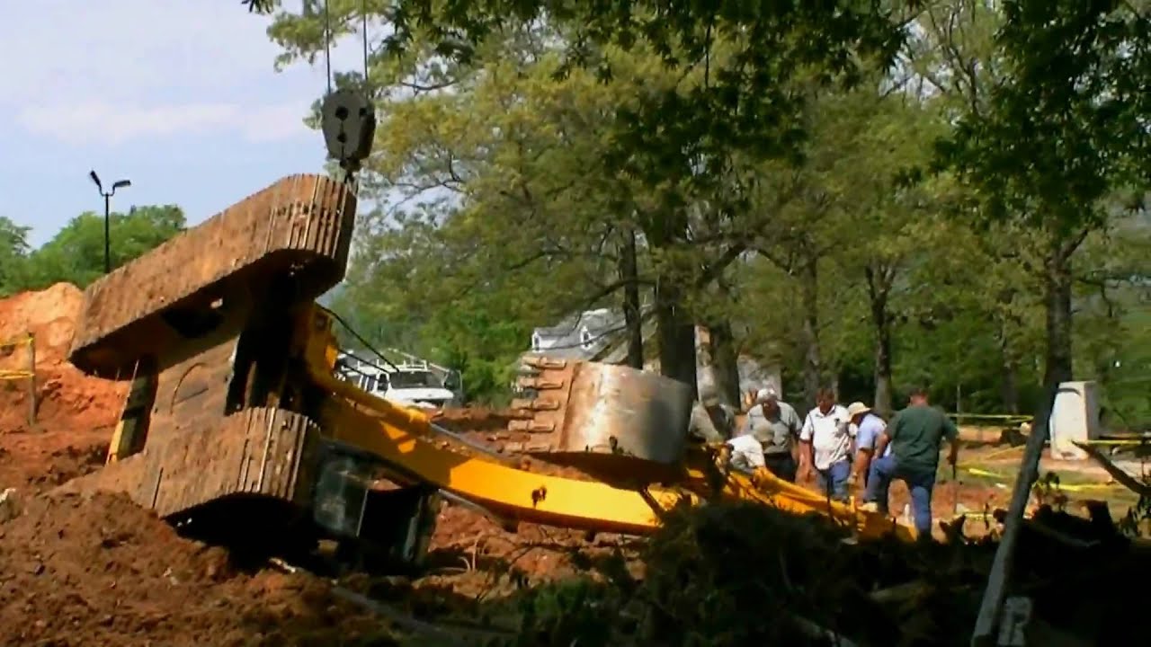 What happens after a JCB falls over - YouTube