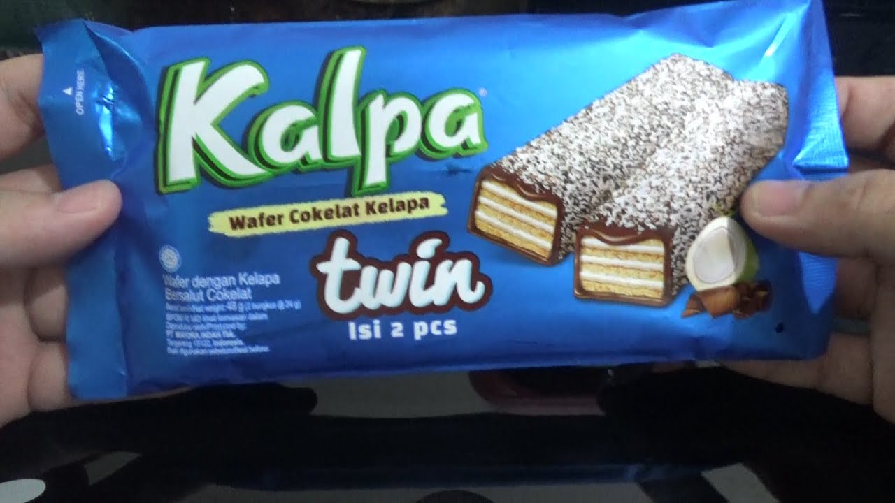 Trying this unique local snack | Kalpa Snack - Coconut flakes on top of ...