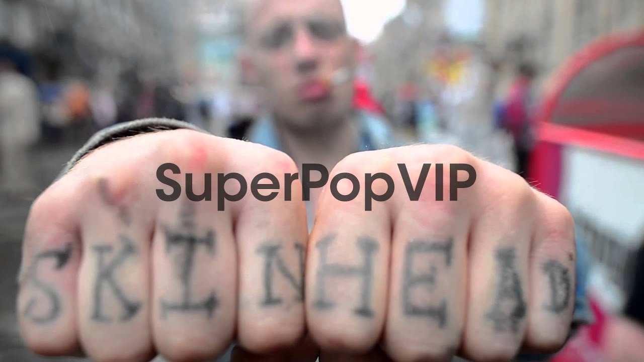Close Up Of A Man's Fists With Tattoo Reading 'SKINHEAD' ... - YouTube