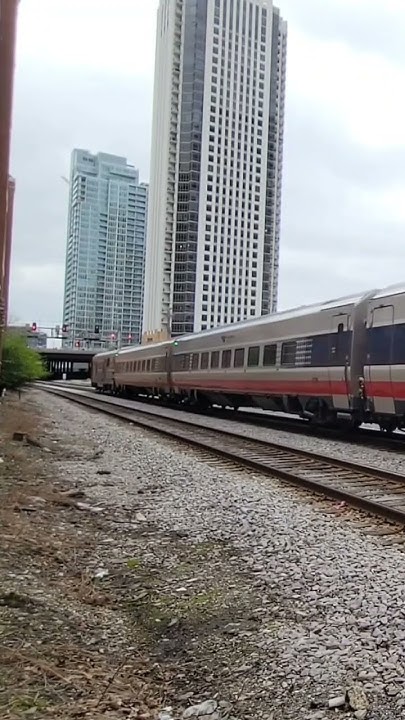 A double headed Amtrak Hiawatha service approaches Clinton Street enroute to Chicago Union ...