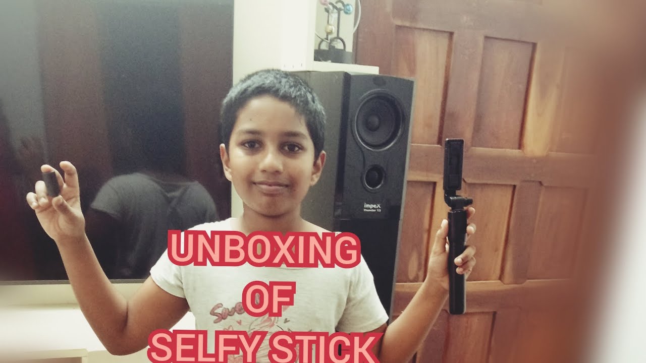 I BOUGHT AND UNBOXED MY SELFY STICK/SINAUX VLOGER - YouTube