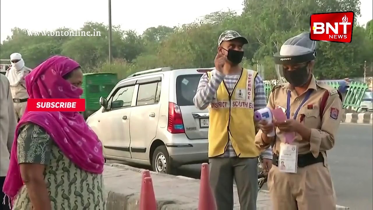 People thronging Okhla vegetable marketgo through mandatory thermal ...