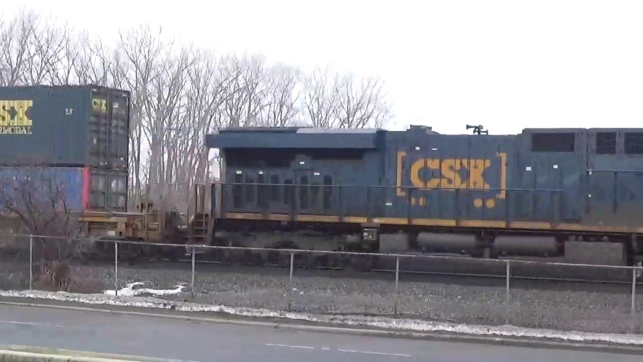 CSX Q004 with CSX 7001 as Mid Train DPU in Syracuse NY...2-25-2020 ...