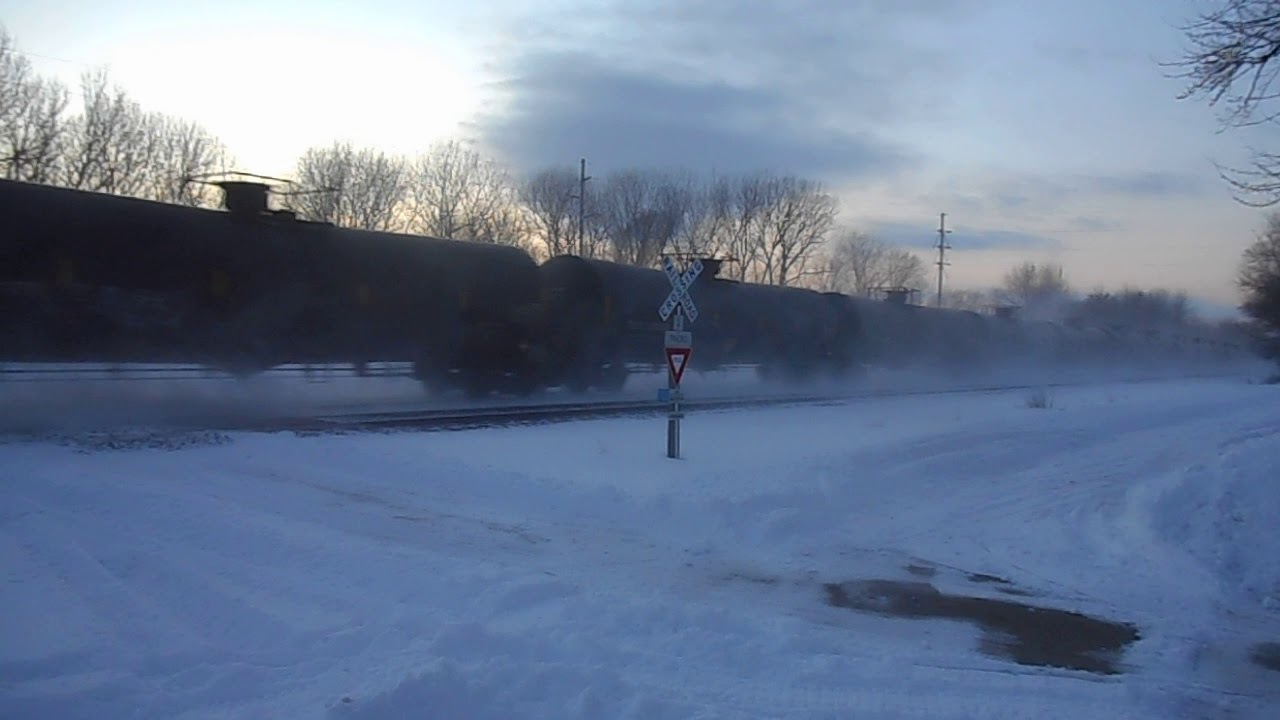 BNSF 6133 w/loaded oil & BNSF 808250 BN green airslide buffer car 2/10 ...