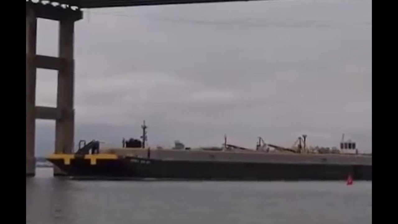 First vessel passes through temporary channel near Key Bridge collapse ...