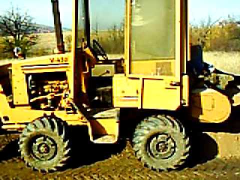 VERMEER V450 Trencher at work - YouTube