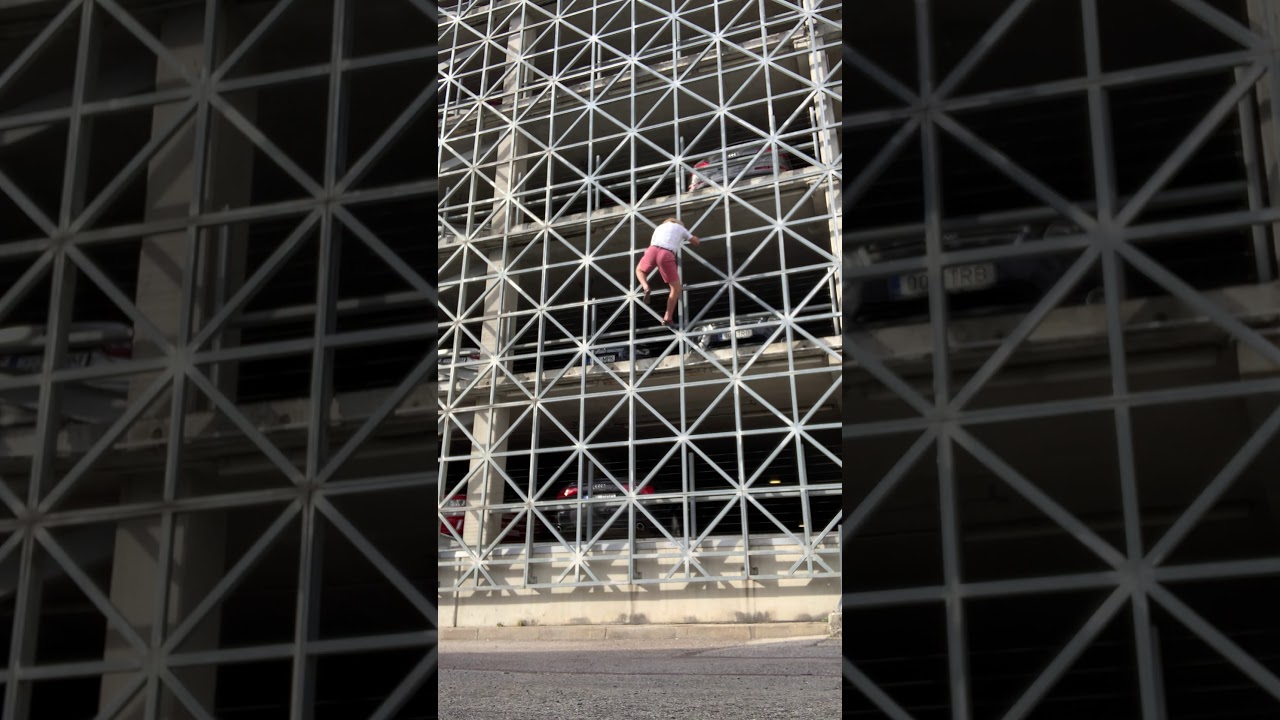 Insane Man climbs up building - YouTube