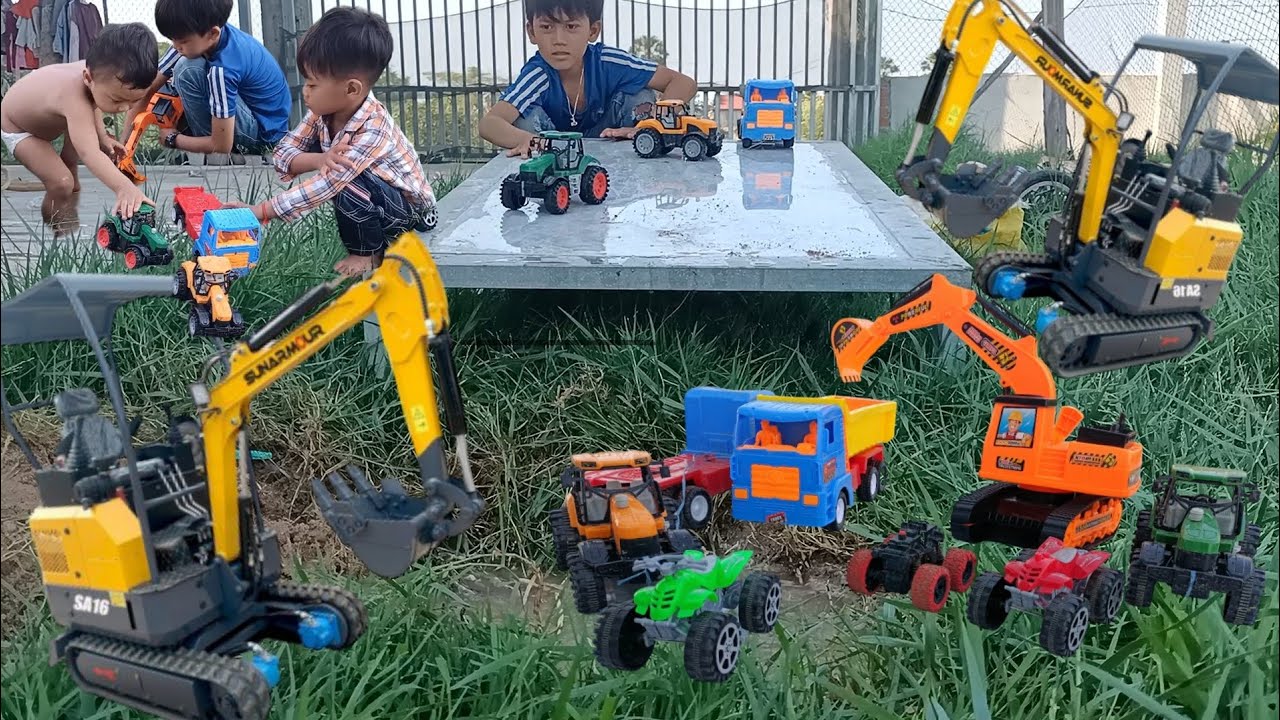 ទ្បានដឹកដីសេរីទំនើប អេស្កាវ៉ាទ័រ ត្រាក់ទ័រ land track Excavator tractor ...