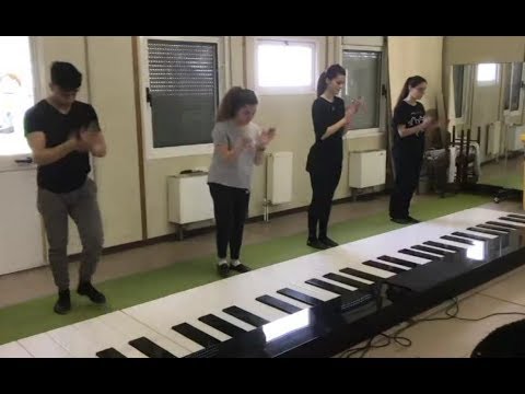 Playing piano with feet - YouTube