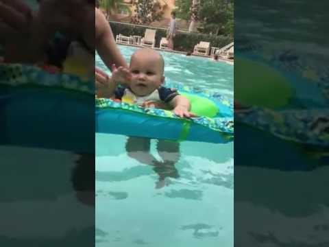 At the pool for the first time with mommy (8/5months)