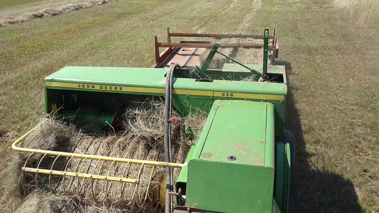 Square baling grass hay - YouTube