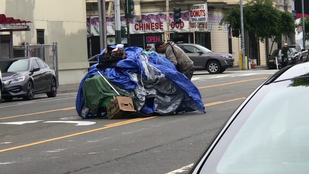 Crazy homeless guy blocking traffic San Francisco California - YouTube