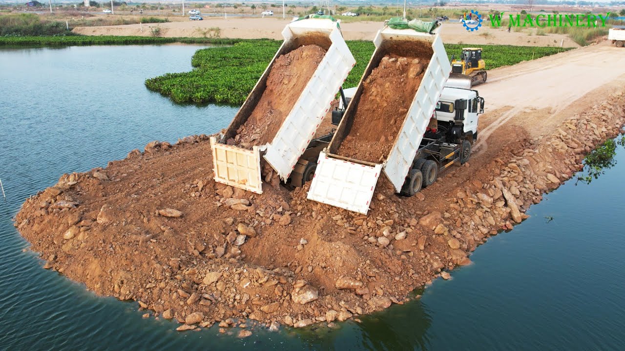 Nice View Dongfeng Dump Truck Dumping Rock And Soil Installing Roads ...