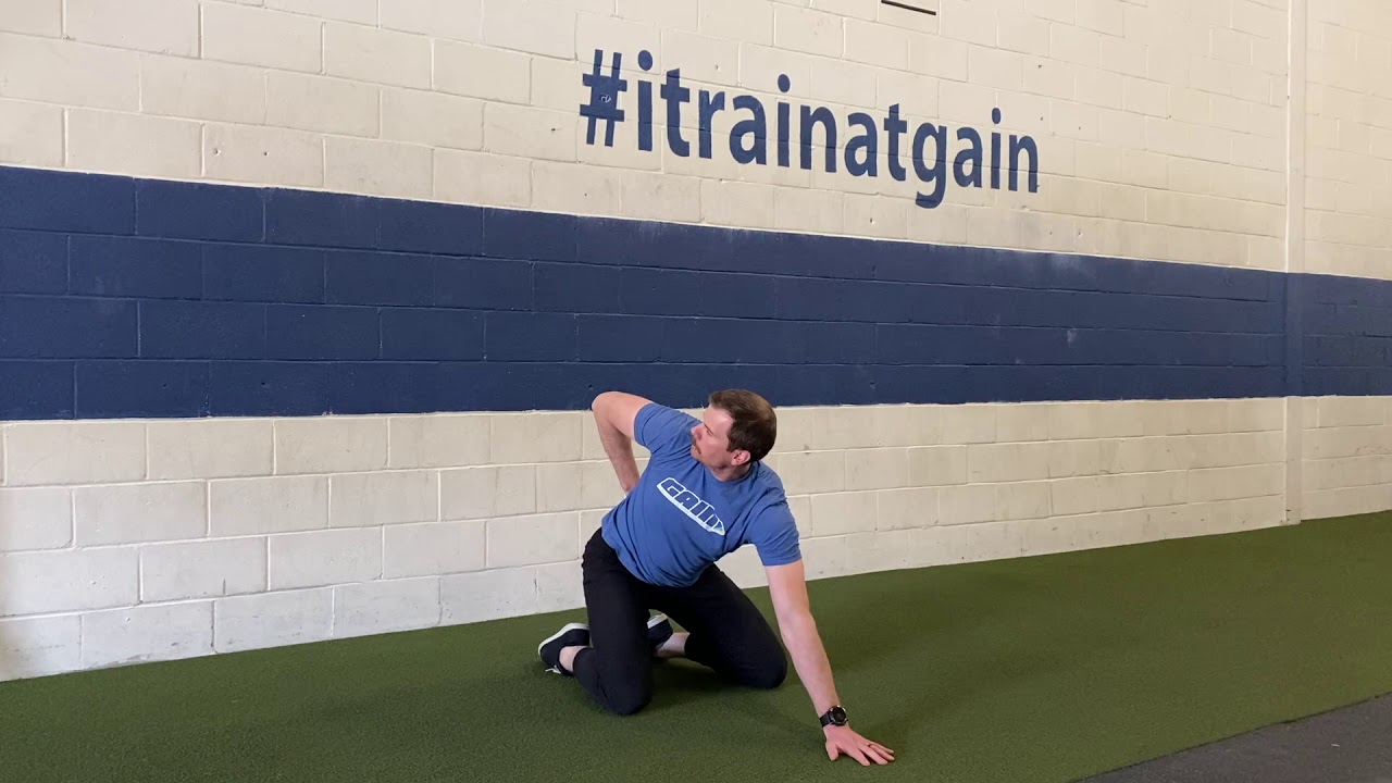 Kneeling T Spine Rotation - hand on lower back - YouTube