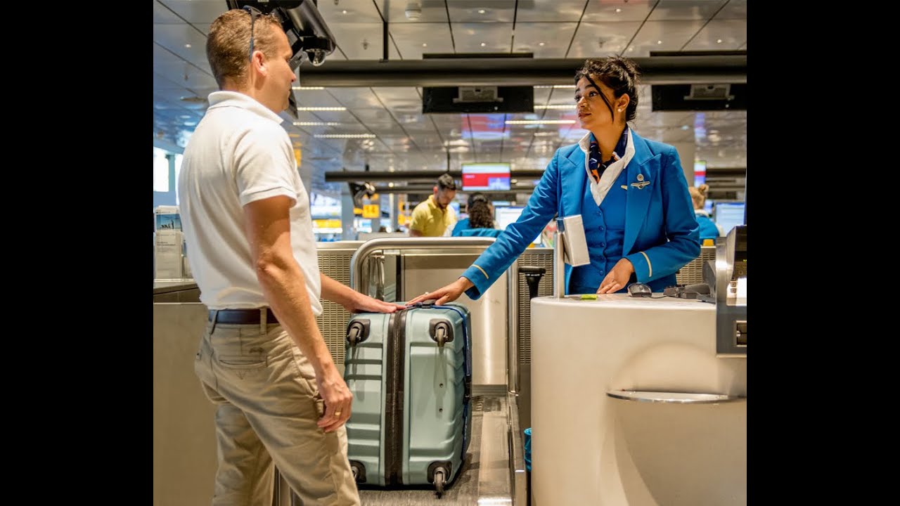 Checking in Luggage at an Airport: English Listening (A2) - YouTube